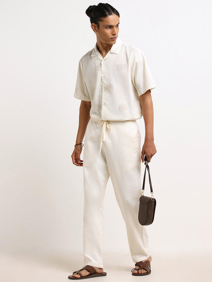 Buy ETA Cream Mid-Rise Cotton Relaxed Fit Chinos from Westside