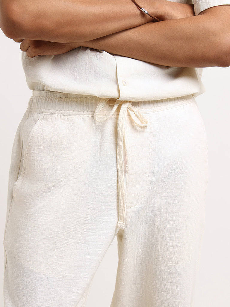 Buy ETA Cream Mid-Rise Cotton Relaxed Fit Chinos from Westside