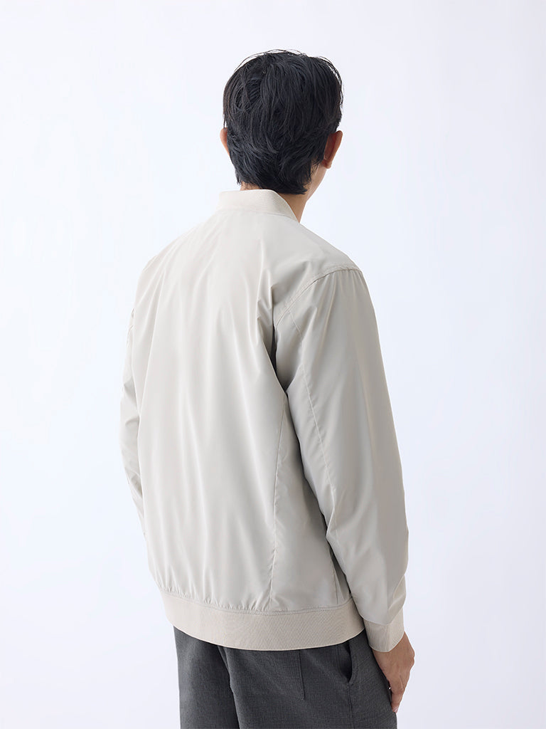 Buy Studiofit Beige Solid Relaxed-Fit Jacket from Westside