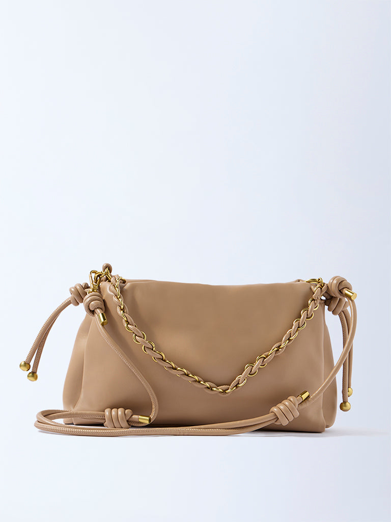 Buy Westside Beige Solid Sling Bag from Westside
