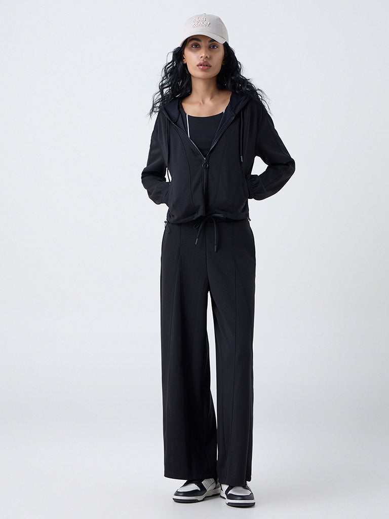 Buy Studiofit Black Solid Hooded Jacket from Westside