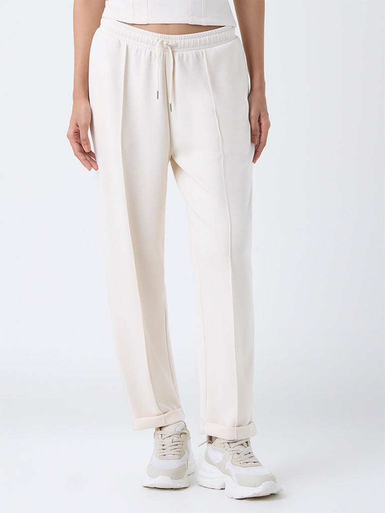 Buy LOV Cream Solid High-Rise Cotton-Blend Track Pants from Westside