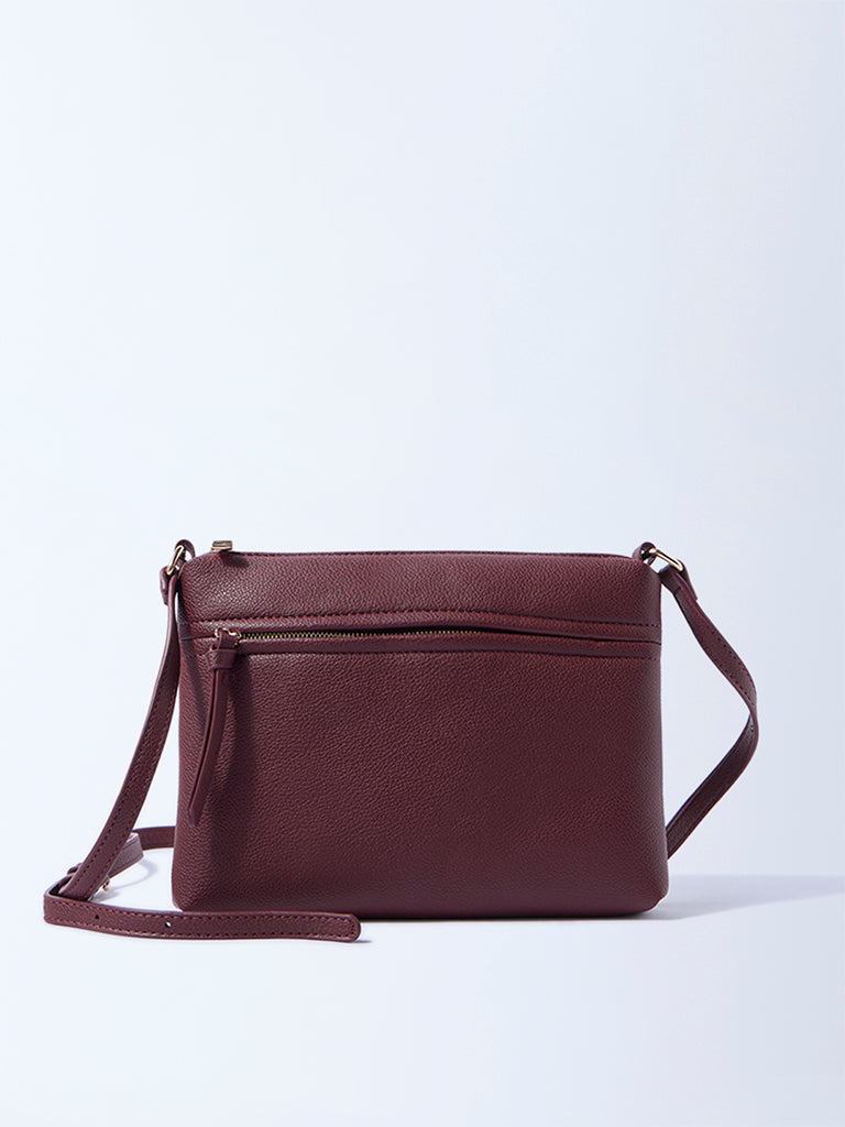Buy Westside Burgundy Textured Sling Bag from Westside