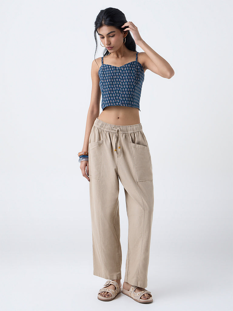 Buy Bombay Paisley Beige Solid Cotton-Blend Pants from Westside
