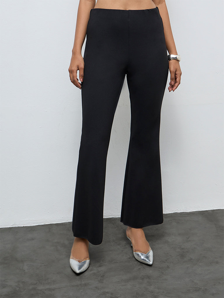 Buy Vark Black Flared Cotton Pants from Westside