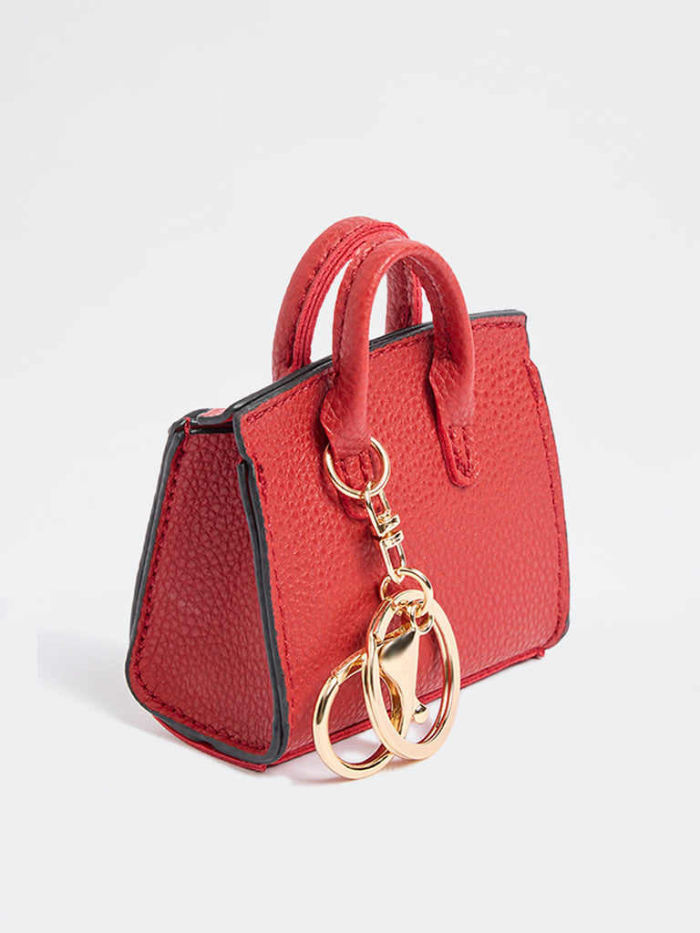Buy Westside Accessories Red Textured Tote Bag Charm from Westside