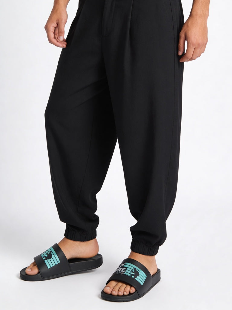 Buy SOLEPLAY Black Graphic Design Pool Slides from Westside